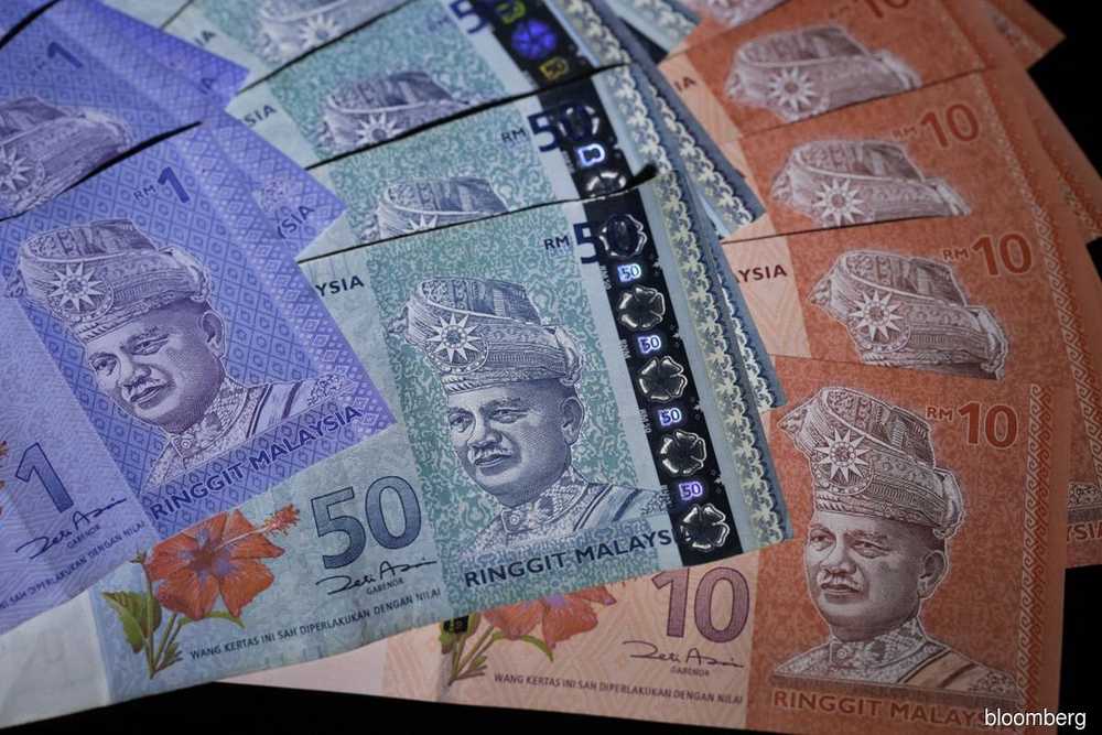 Ringgit opens higher against US dollar