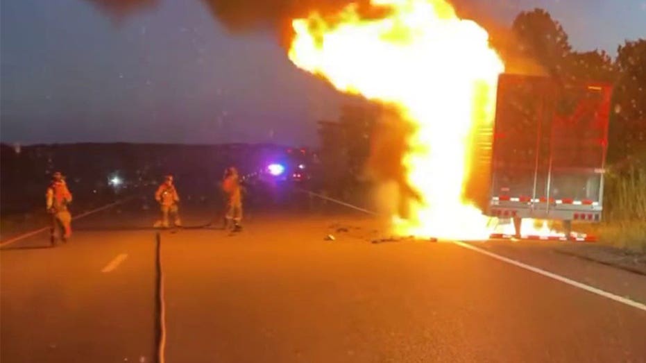 Vegan firefighter hoses down burning tractor-trailer carrying 40,000 ...