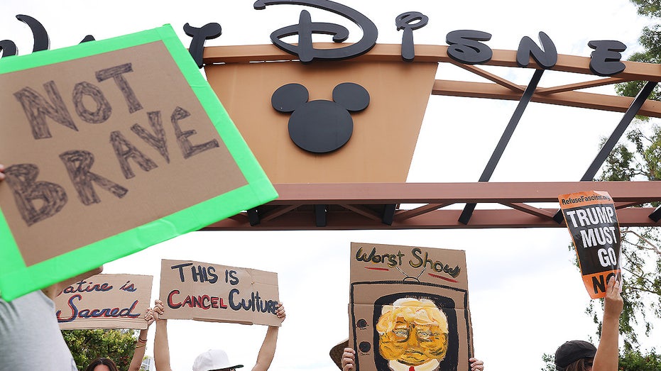Protesters rally outside Disney, Jimmy Kimmel's studio to demand late ...