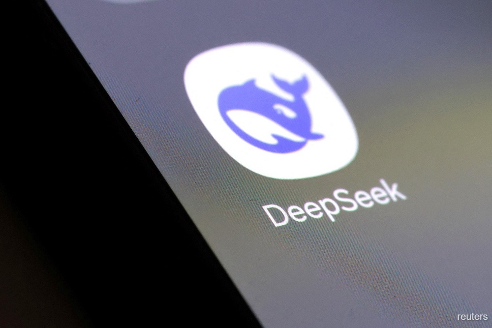 DeepSeek’s overnight fame strains its systems, draws attacks