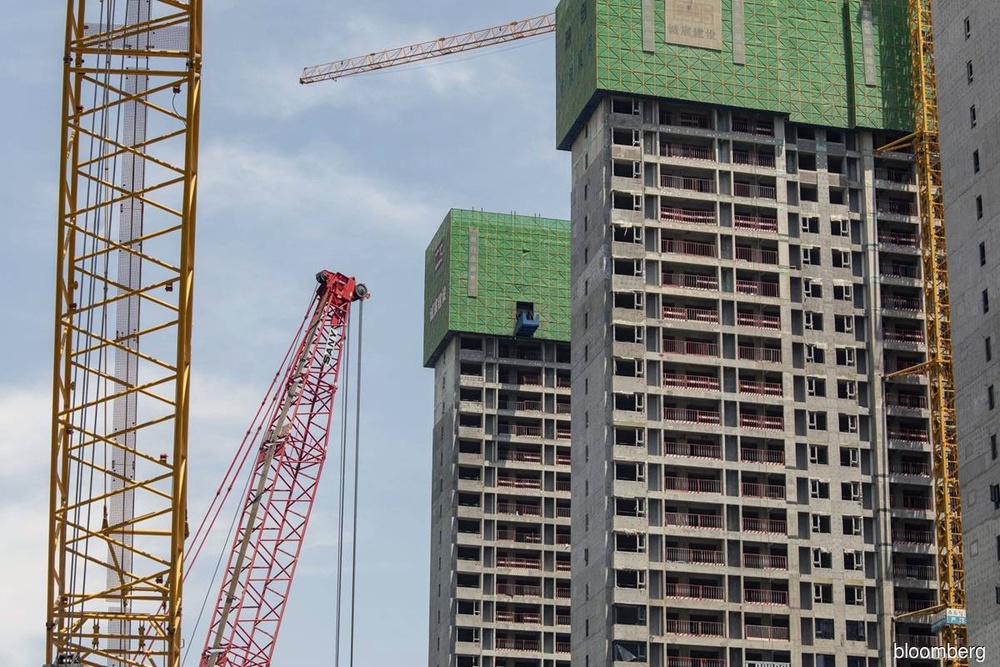 China asks state-owned developers to avoid public debt defaults