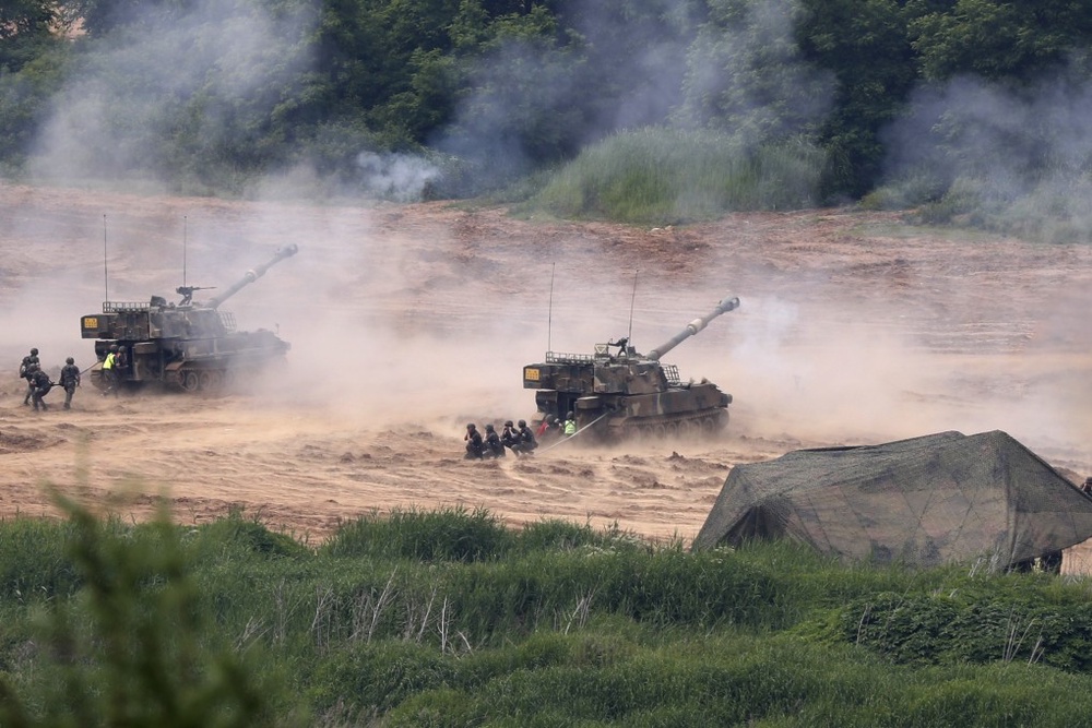 North Korean soldiers cross tense DMZ border, South Korea fires warning shots