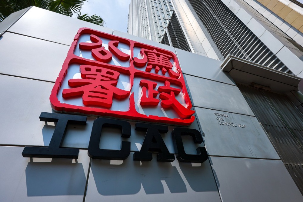 Ex-chairman of Hong Kong-listed Neo-China surrenders after 13 years on ...