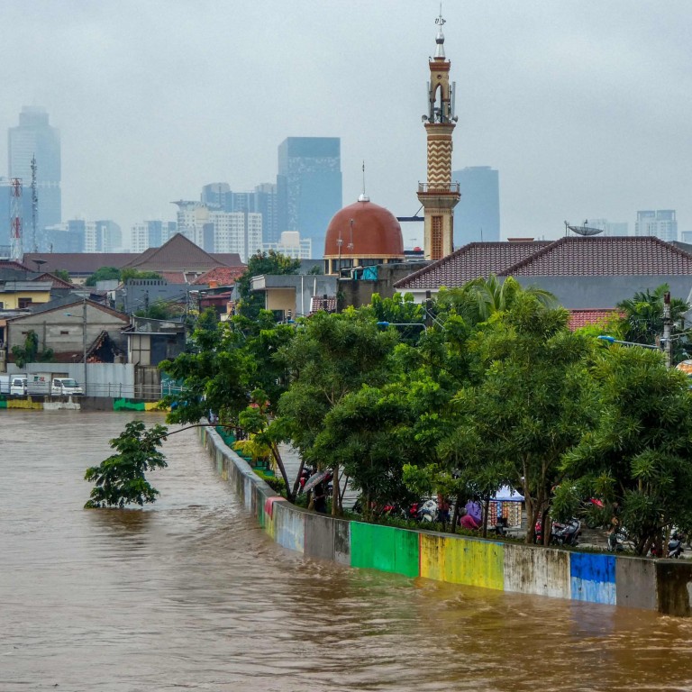 Indonesia aims to stop Jakarta from sinking further by curbing ...