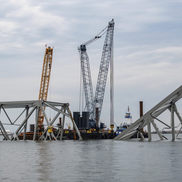 Crews work to lift first piece of collapsed Baltimore bridge in ... Crews work to lift first piece of collapsed Baltimore bridge in ...