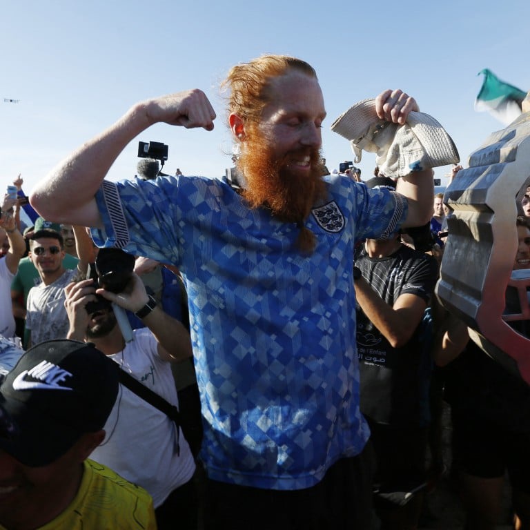 Ten thousand miles and 352 days later, UK man reaches goal of running ...