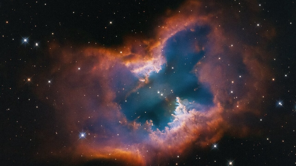 Hubble Telescope snaps stunning portraits of Mars, a celestial moth and ...