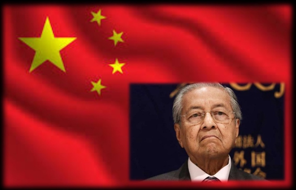 It is all the commies fault, says Mahathir