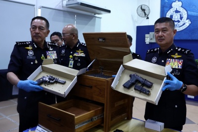 Police Raid Nets Guns, Drugs, and Trafficking Suspects in Double Takedown