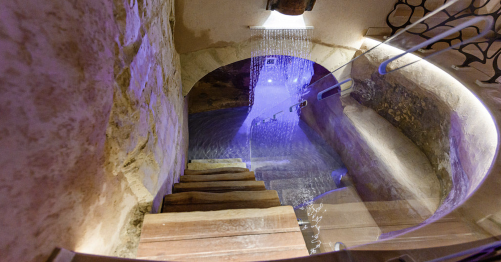 This Hotel in Italy Has a Room With an Underground Cave Pool