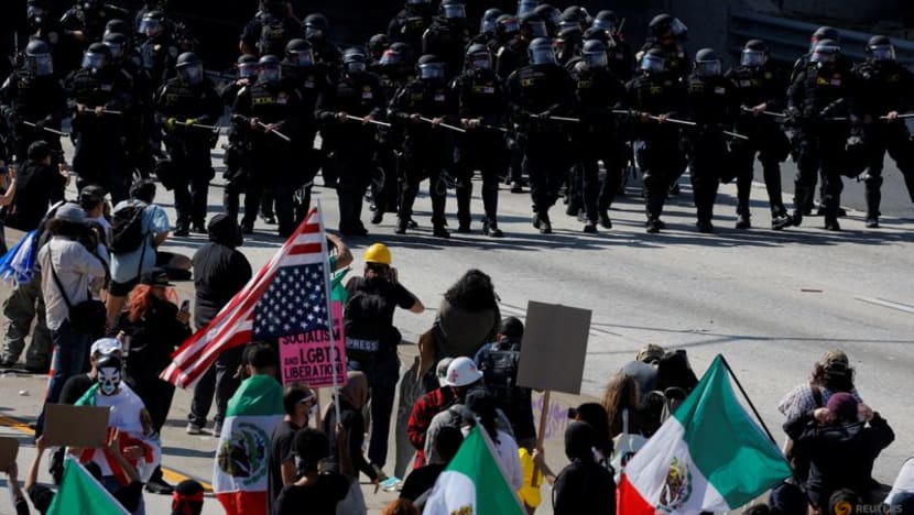 Los Angeles police order immigration protesters in downtown to go home