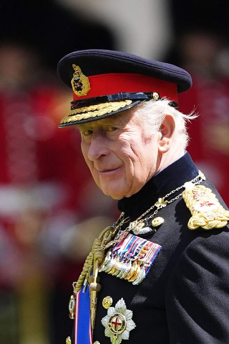 King Charles and Queen Camilla present new Colours at Buckingham Palace ...