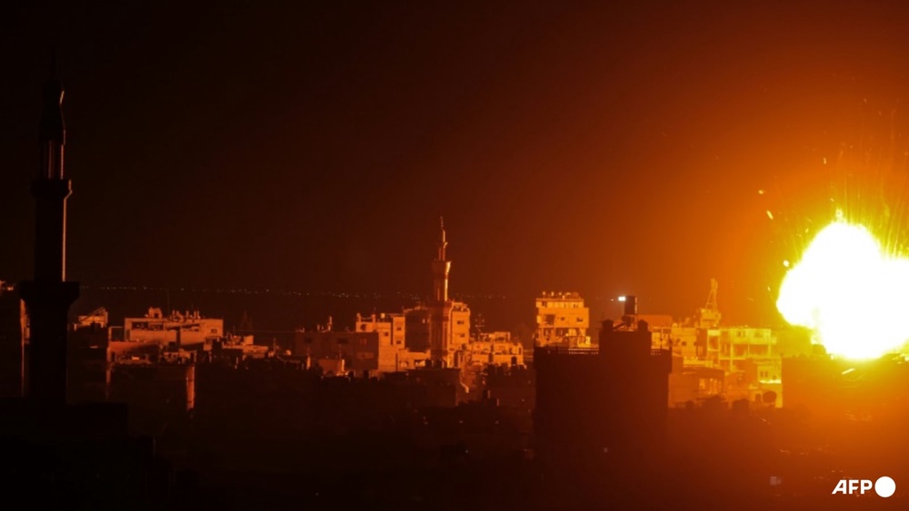 Israel bombs Gaza, fights Hamas around hospitals