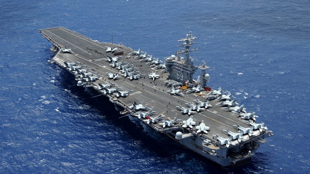 Second US aircraft carrier to back Israel as Biden stresses civilian protection