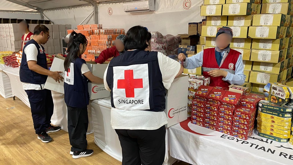'Build bridges, not walls': The Singapore volunteers on a mission to ...