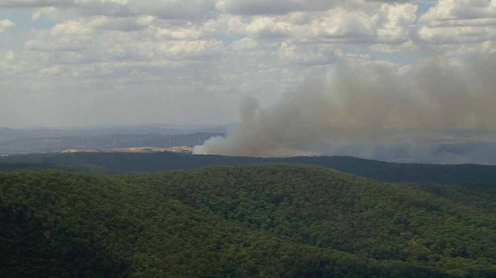 Bushfire in central Victoria downgraded after wind change pushes flames ...