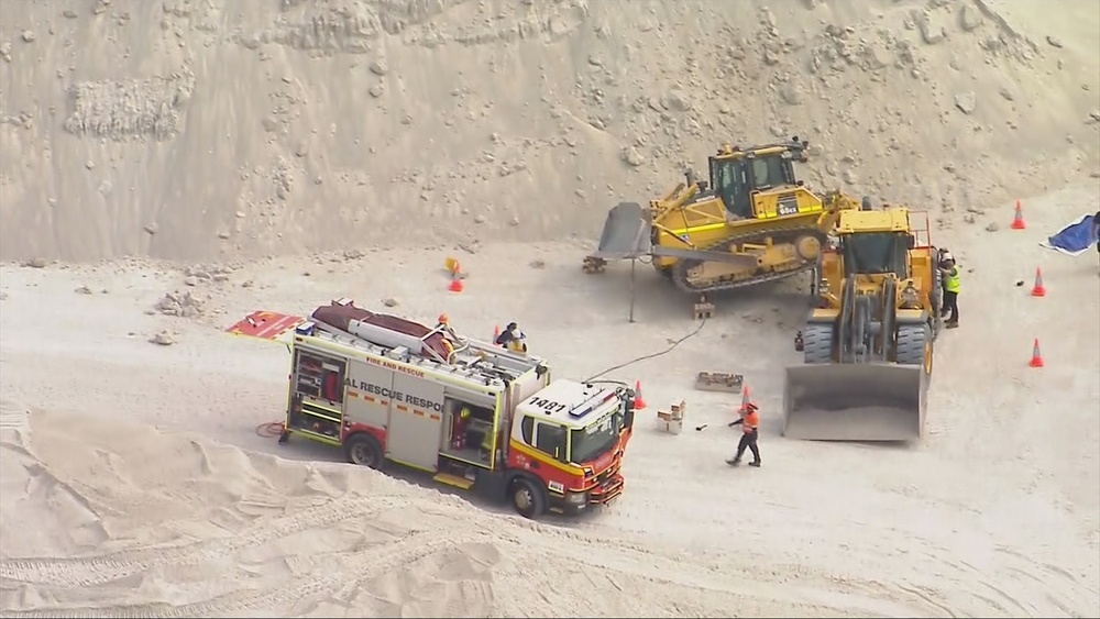Man killed after bulldozer rolls at Port of Brisbane worksite