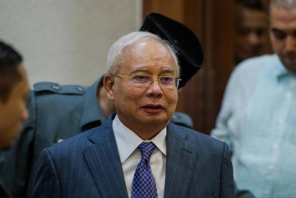 Najib's 1MDB trial cut short as witness down with Covid-19
