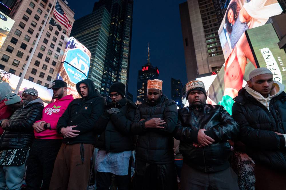 Muslims gather to pray in NY's Times Square as Ramadan begins