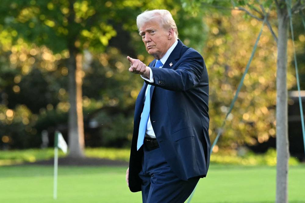 Man charged with shining laser pointer at Trump helicopter