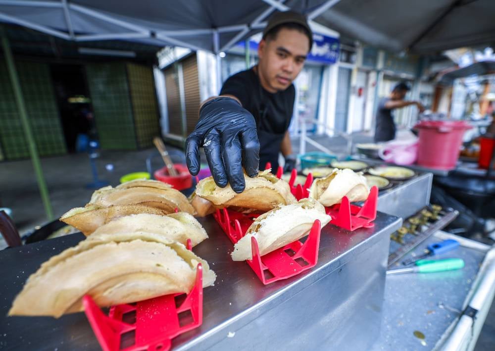 Biotech graduate returns to Bidor to save family’s 40-year Apam Balik ...