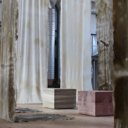 Natural Material Studio drapes floor-to-ceiling biotextiles across ...