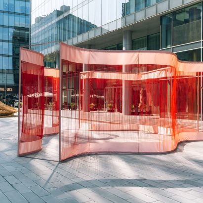 Areen unravels silk fabric for Flowing Threads installation at Dubai ...