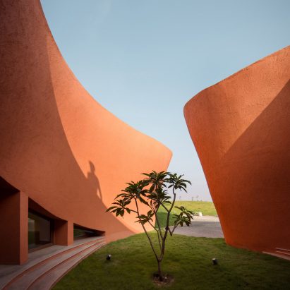 Sameep Padora & Associates creates flowing concrete form for Indian ...