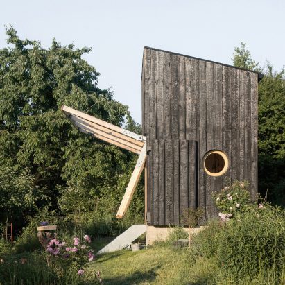 Byró Architekti creates wooden garden pavilion with folding facade