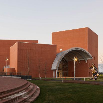 SANAA assembles trio of red-brick cuboids for MIT music building