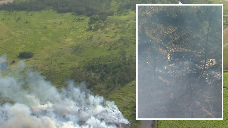 Fiery plane crash kills two south of Brisbane, sparks massive blaze