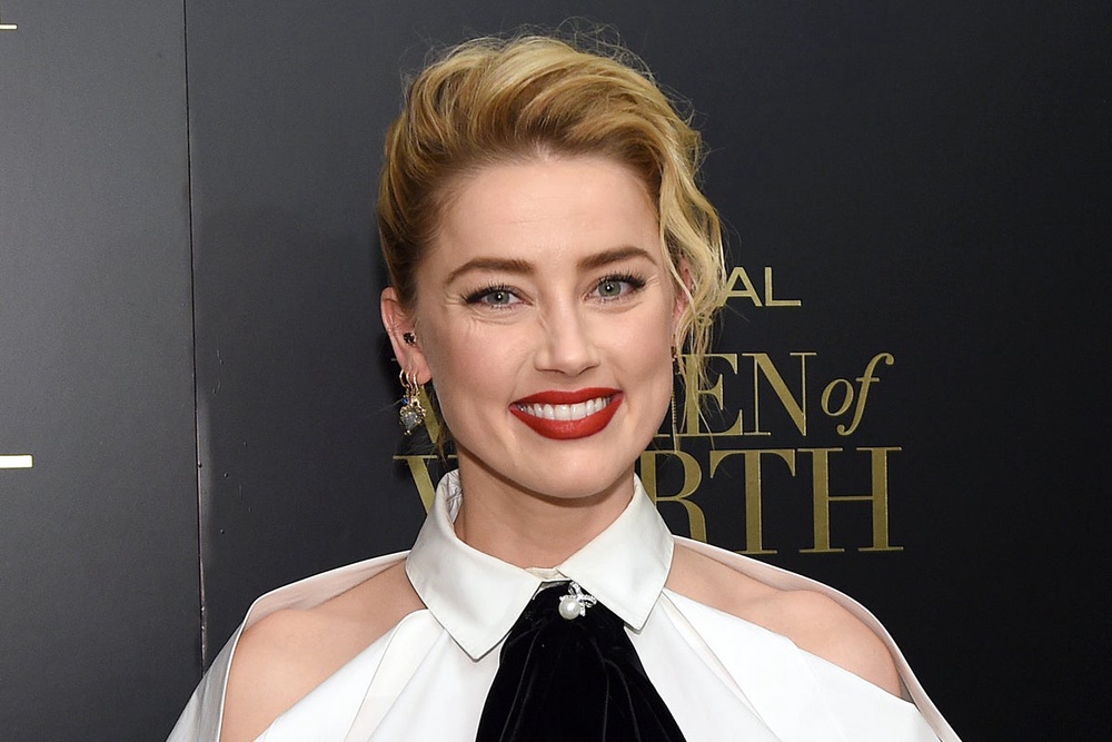 Amber Heard reveals she has welcomed twins despite ‘fertility challenges’