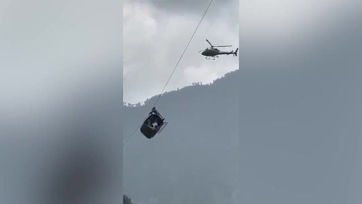 Moment Pakistan cable car rescue team winch child to safety captured in ...