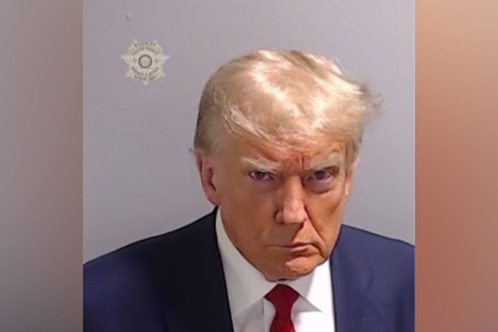 Trump scowls in historic mug shot after arrest at Fulton County Jail Trump scowls in historic mug shot after arrest at Fulton County Jail