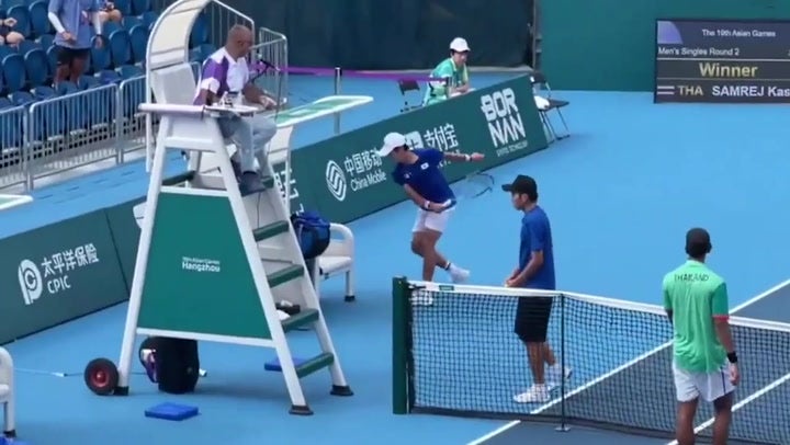 Furious South Korean tennis player angrily smashes racket and refuses ...