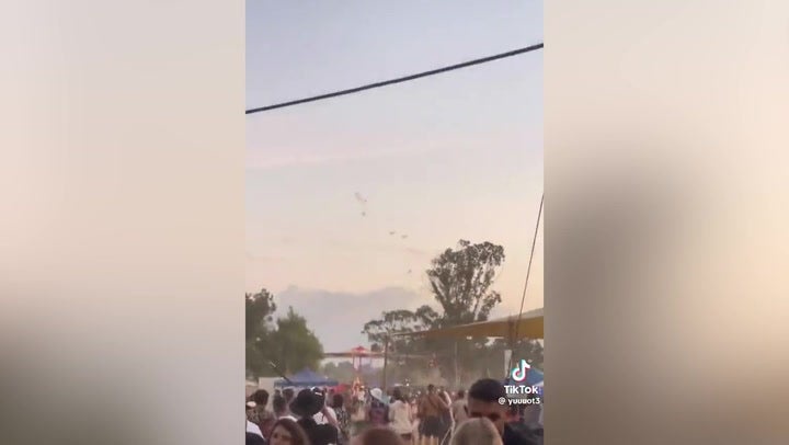 Hamas paragliders descend on Israel music festival as people flee massacre