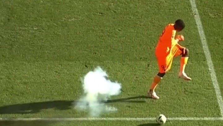 Firecracker explodes near goalkeeper as he falls to ground injured and ...