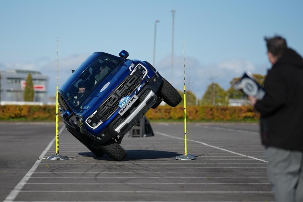 British stuntman breaks world record for driving truck on two wheels ...