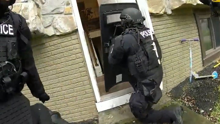 Moment police injure 17-month-old during raid on incorrect home