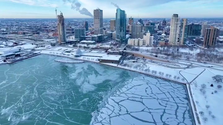 Milwaukee frozen in snow and ice in stunning drone footage as cold snap ...