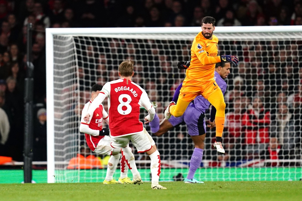 Arsenal capitalise on Alisson Becker errors to cut Liverpool lead to ...