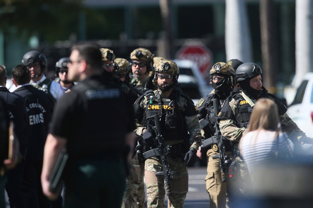 A SWAT team sniper killed a bank hostage-taker armed with a knife ...
