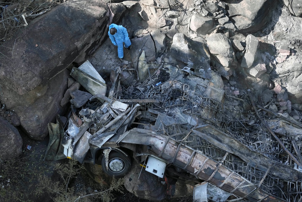 Burned bodies of Easter pilgrims still lie inside a bus that crashed ...