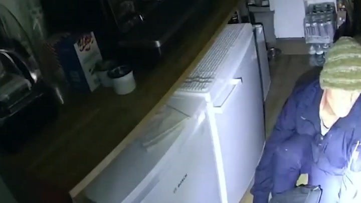 Bungling burglar caught hiding behind restaurant counter by police