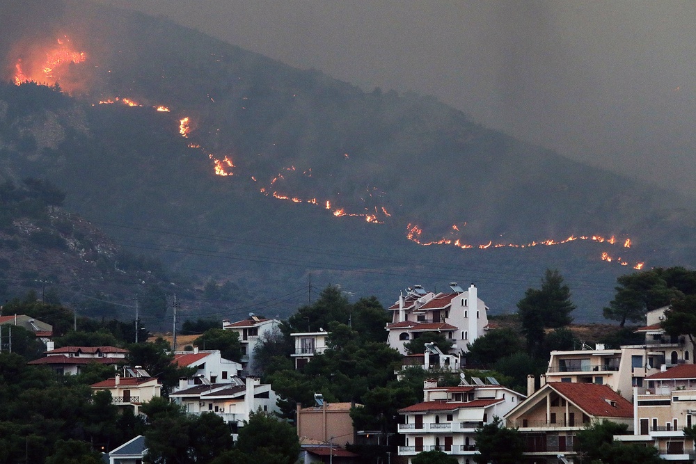 Greece wildfires - latest: Evacuations ordered on edge of Athens as ...