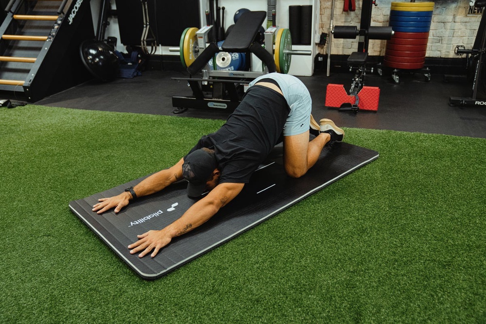 Flexibility expert recommends four stretches for easing back pain and ...