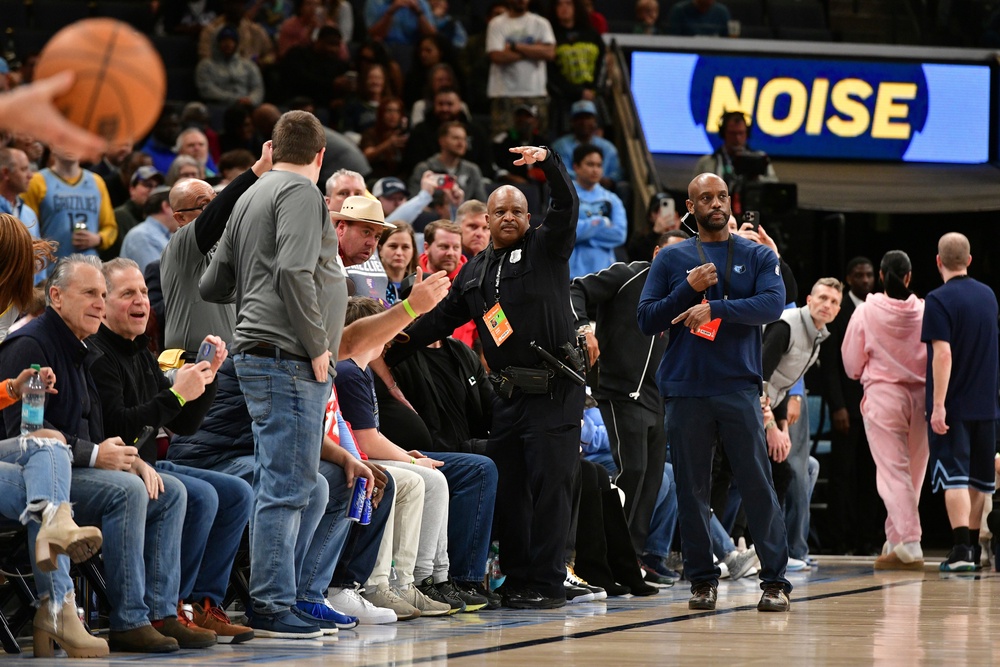 Medics attend to person who collapsed courtside at Spurs, Grizzlies game