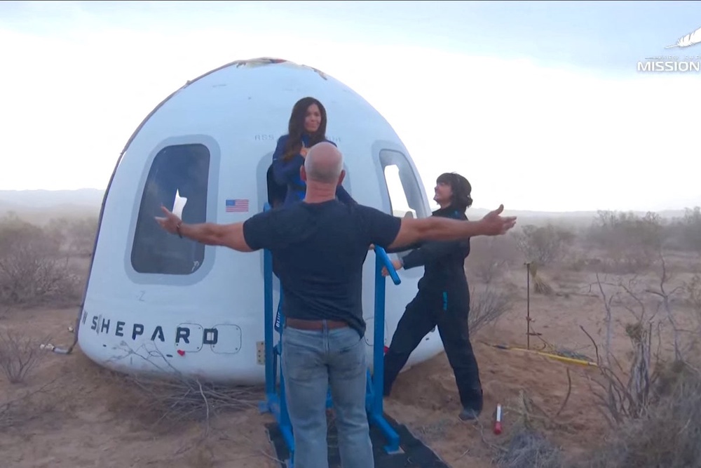 Moment Jeff Bezos falls flat on his face running to greet Blue Origin space capsule