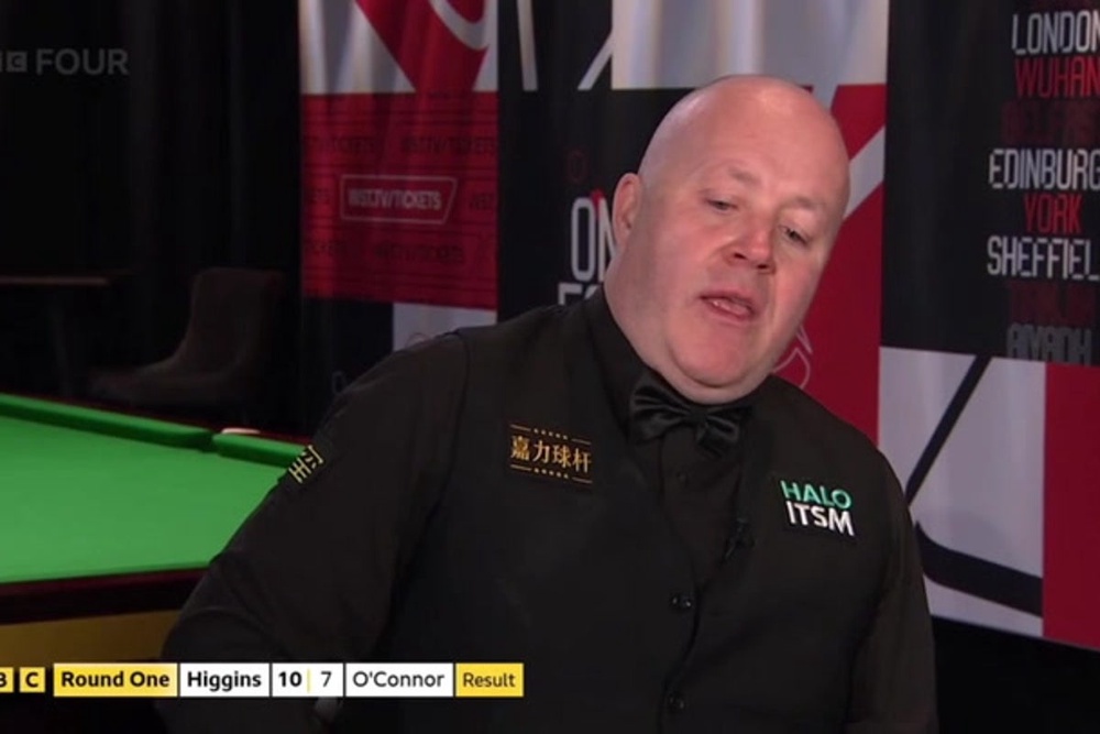 Snooker champion John Higgins comforted by BBC presenter after bursting ...