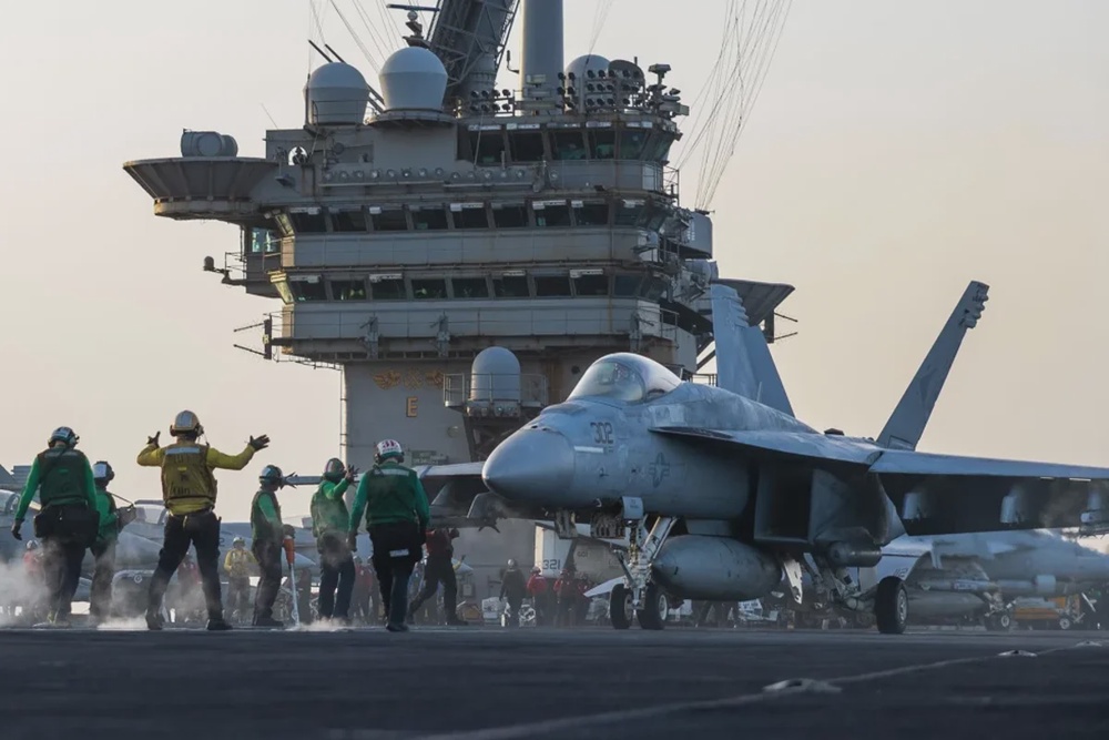 Sailor injured as $60m US fighter jet topples off aircraft carrier dodging Houthi rebel strike